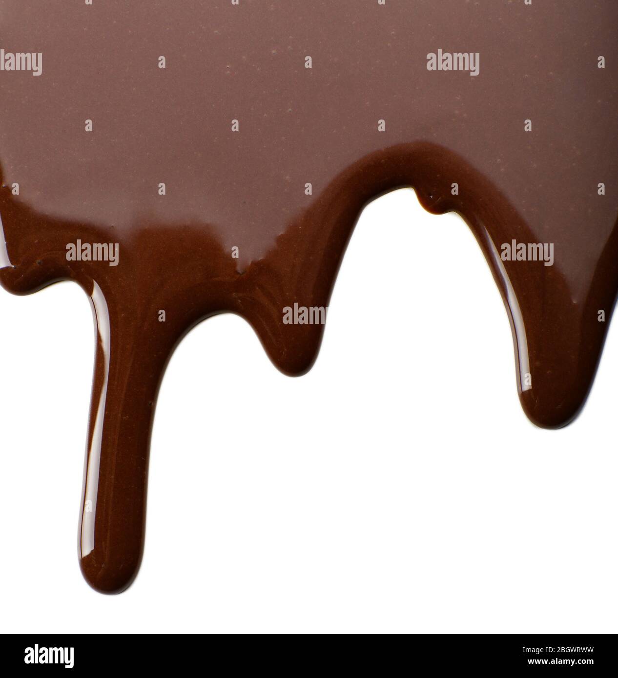 Melted chocolate dripping on white background Stock Photo - Alamy