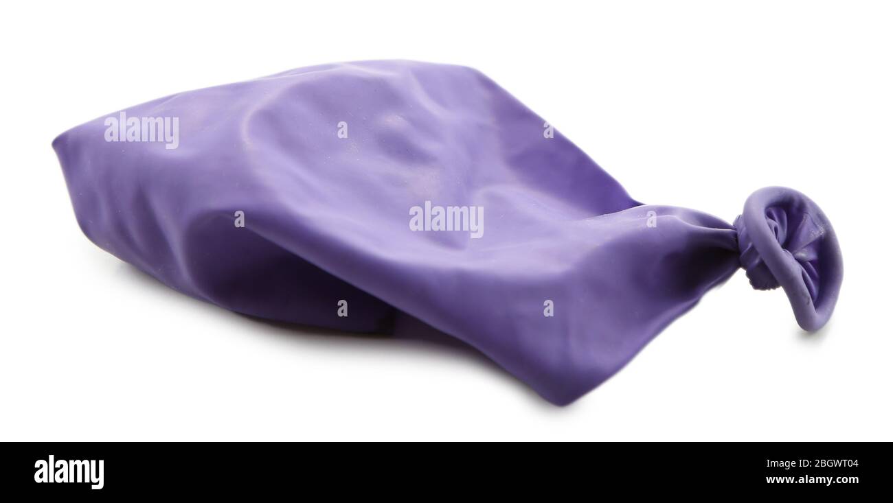 Popped violet balloon isolated on white Stock Photo - Alamy