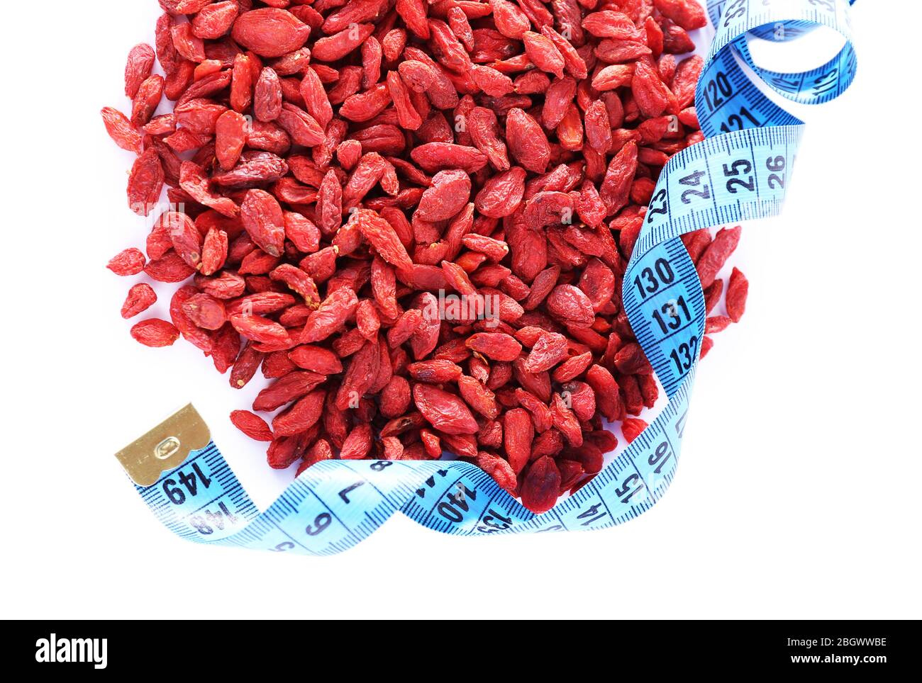 Goji berries and blue measuring tape line isolated on white Stock Photo ...