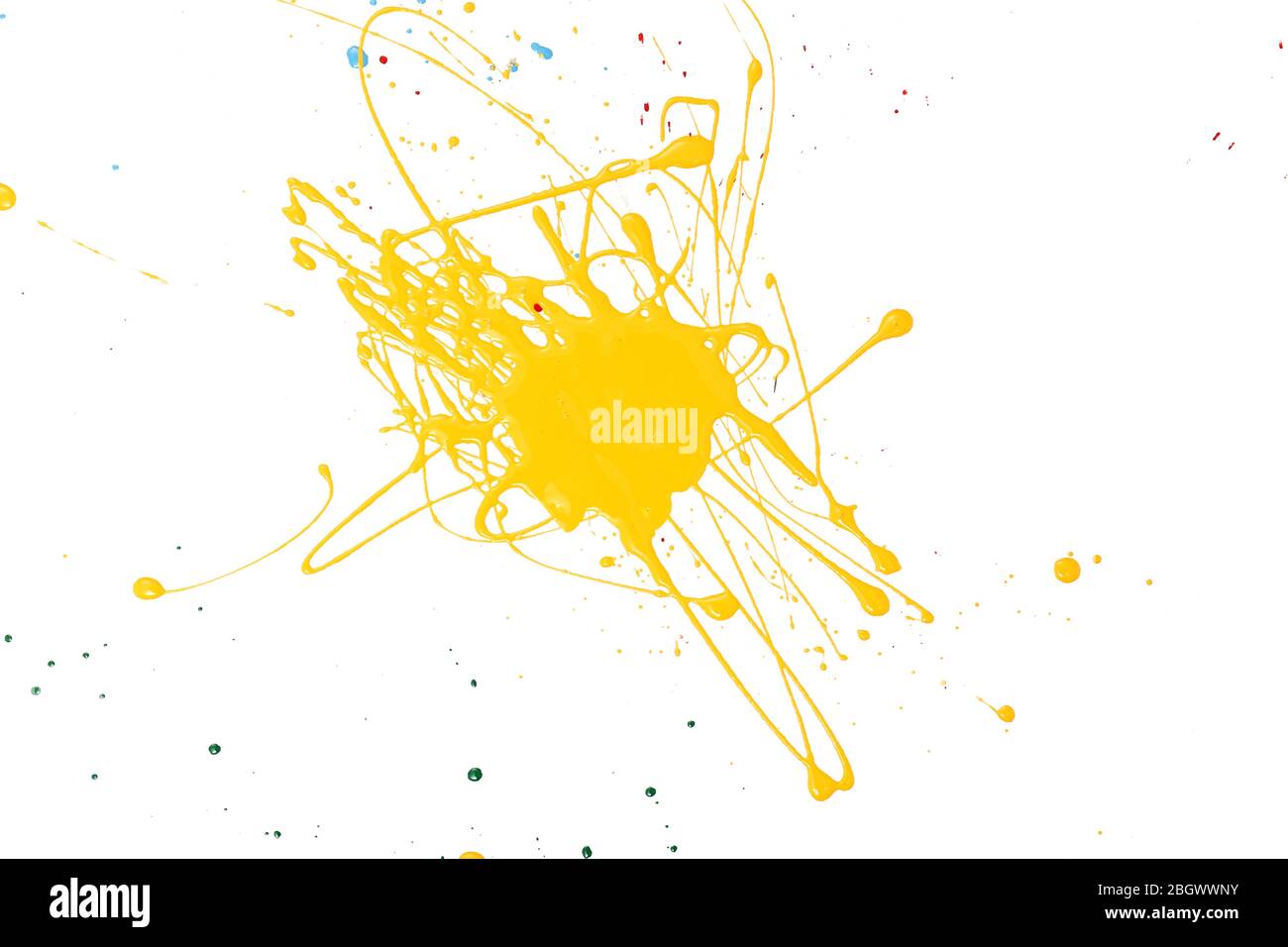 Splash of yellow paint isolated on white Stock Photo - Alamy