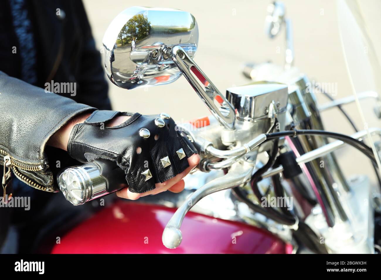 Hand rider on handlebars, close-up Stock Photo - Alamy