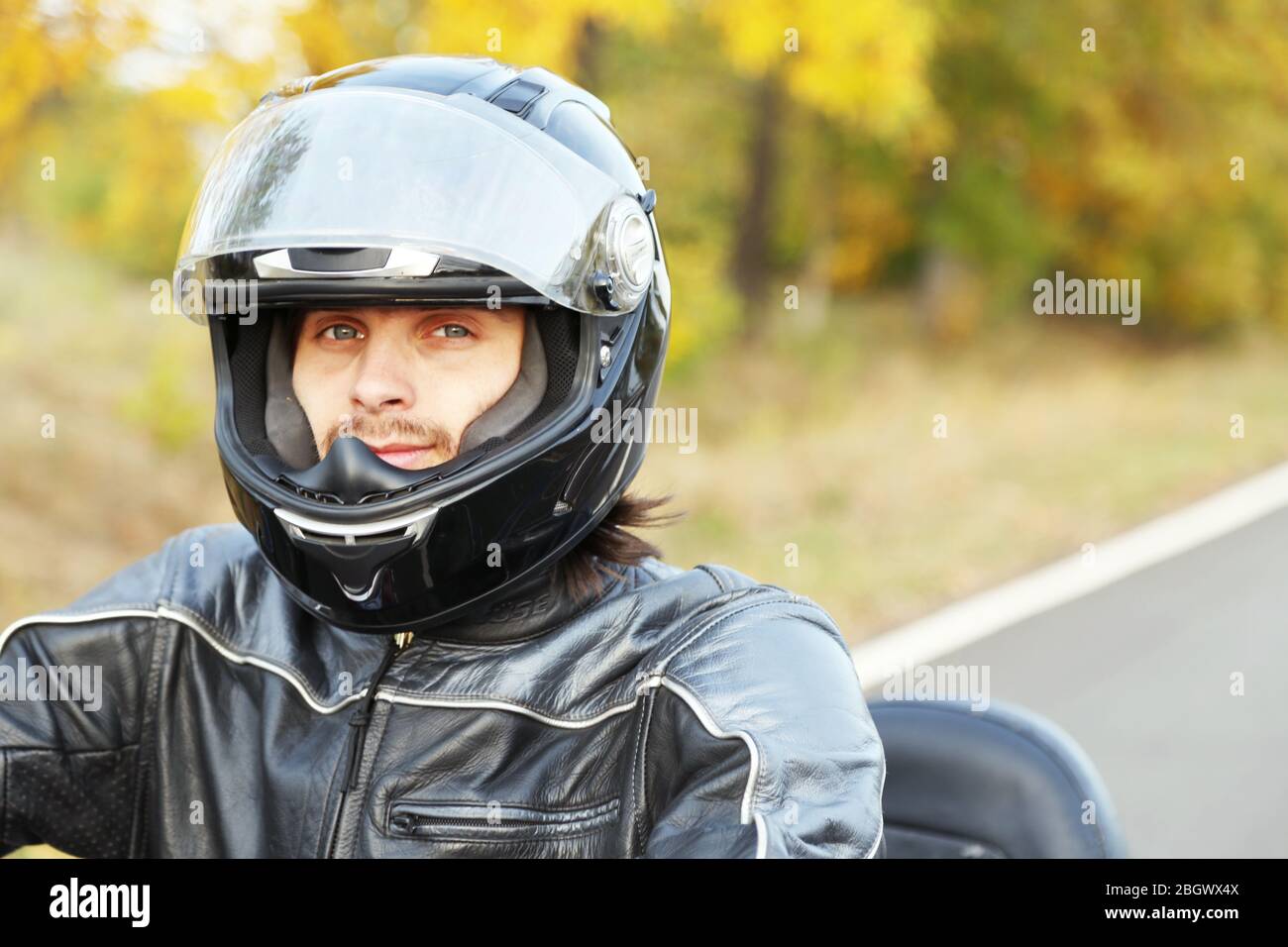 Man helmet hair motorcycle hi-res stock photography and images - Alamy