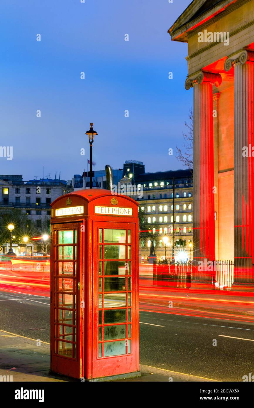 London Telephone box at night with streaming vehicle headlights Stock ...