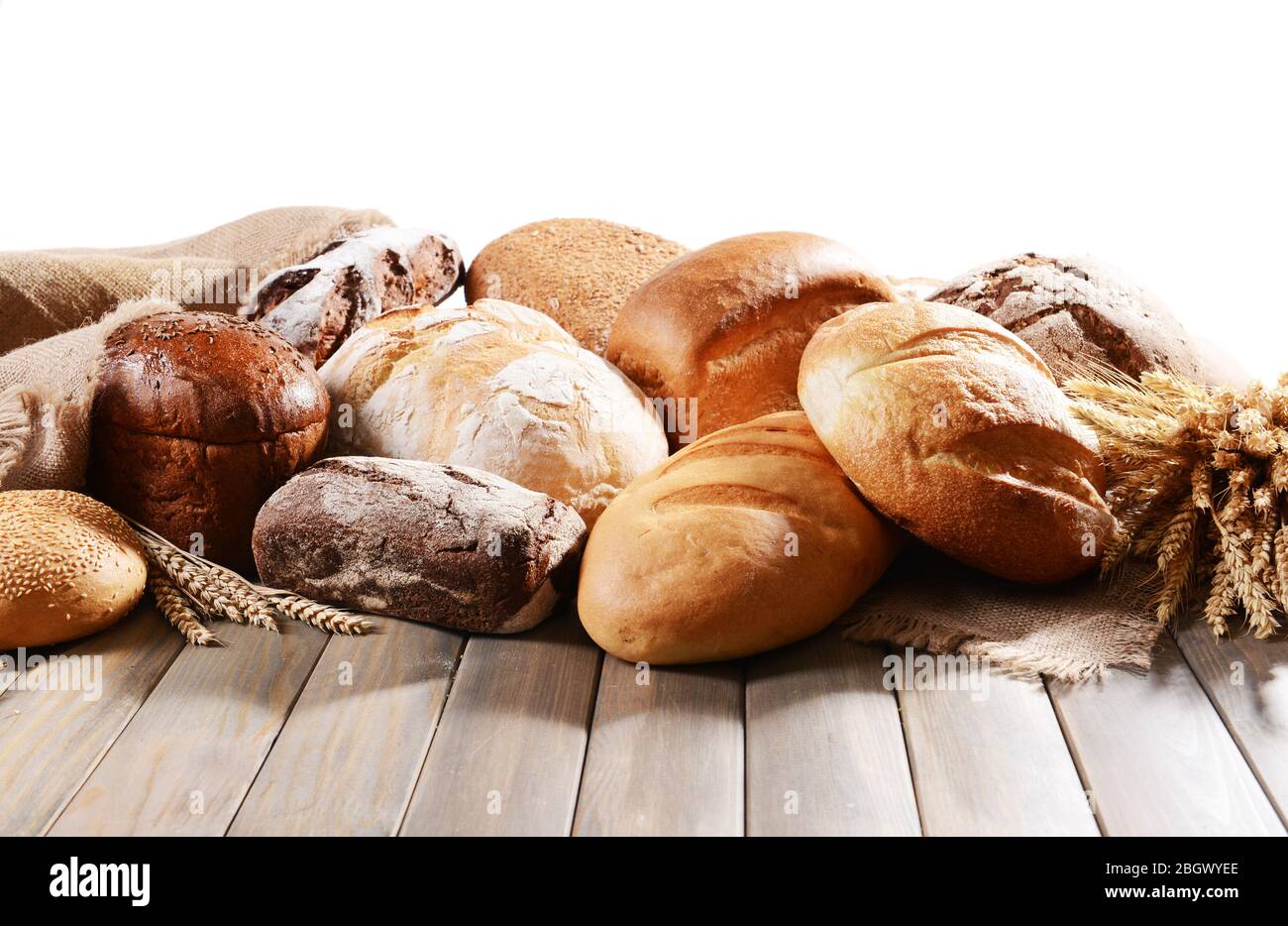 Fresh bread on table on white background Stock Photo - Alamy