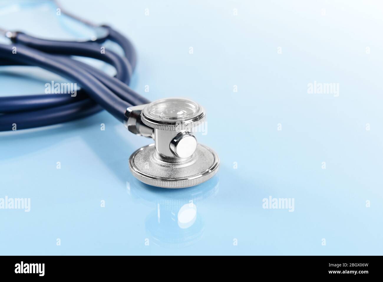 Stethoscope on light blue background Stock Photo - Alamy