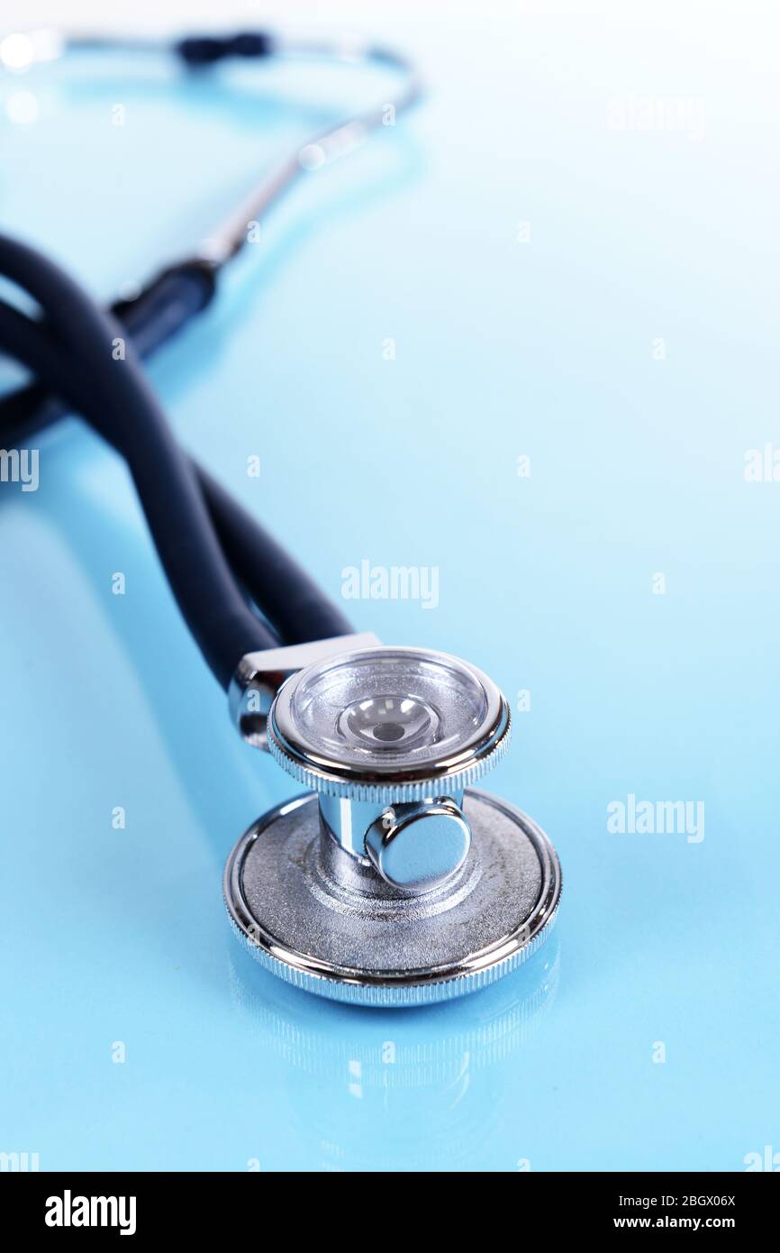 Stethoscope on light blue background Stock Photo - Alamy