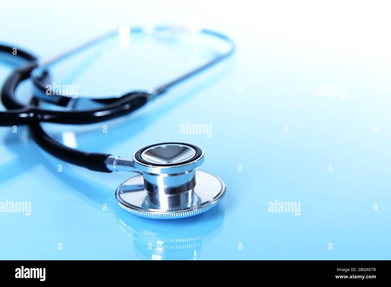 Stethoscope on light blue background Stock Photo - Alamy