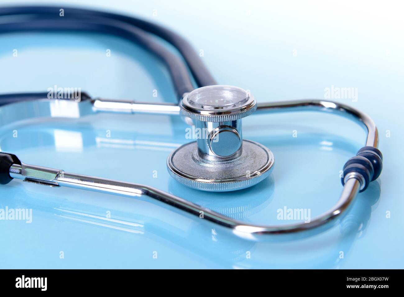 Stethoscope on light blue background Stock Photo - Alamy