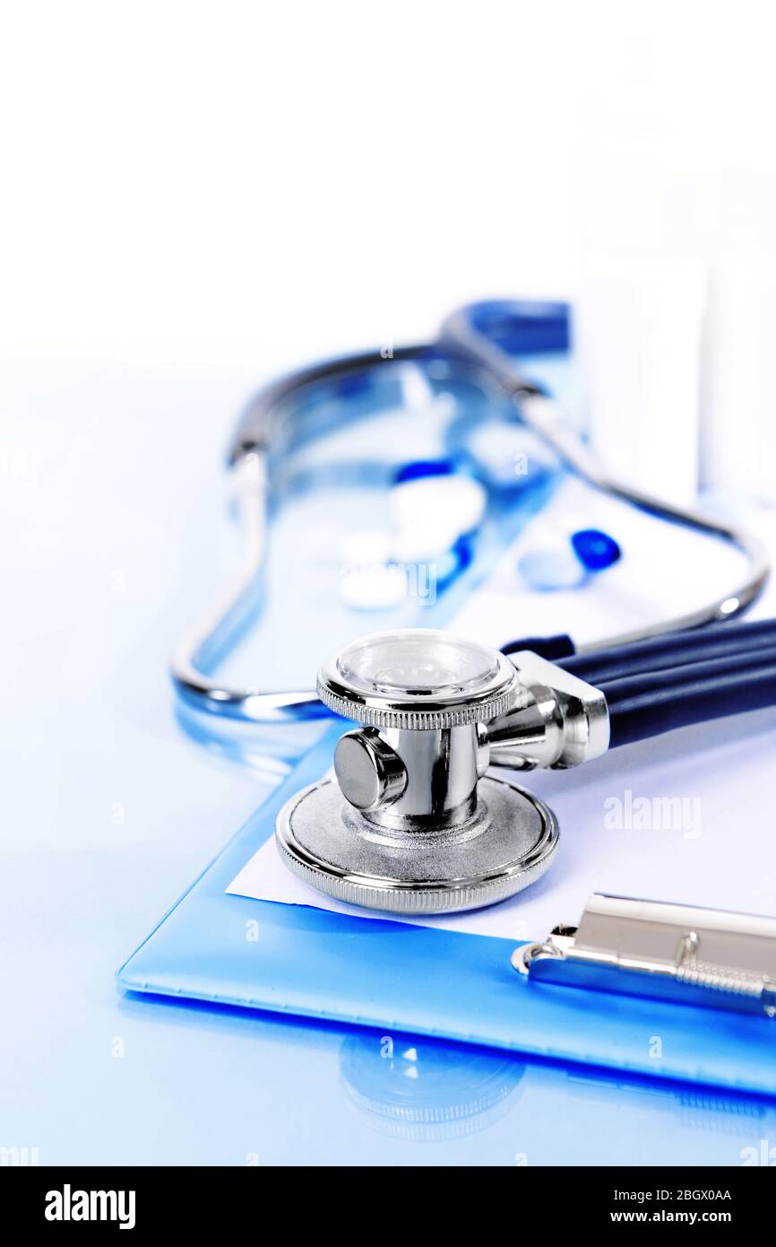 Stethoscope on light blue background Stock Photo - Alamy