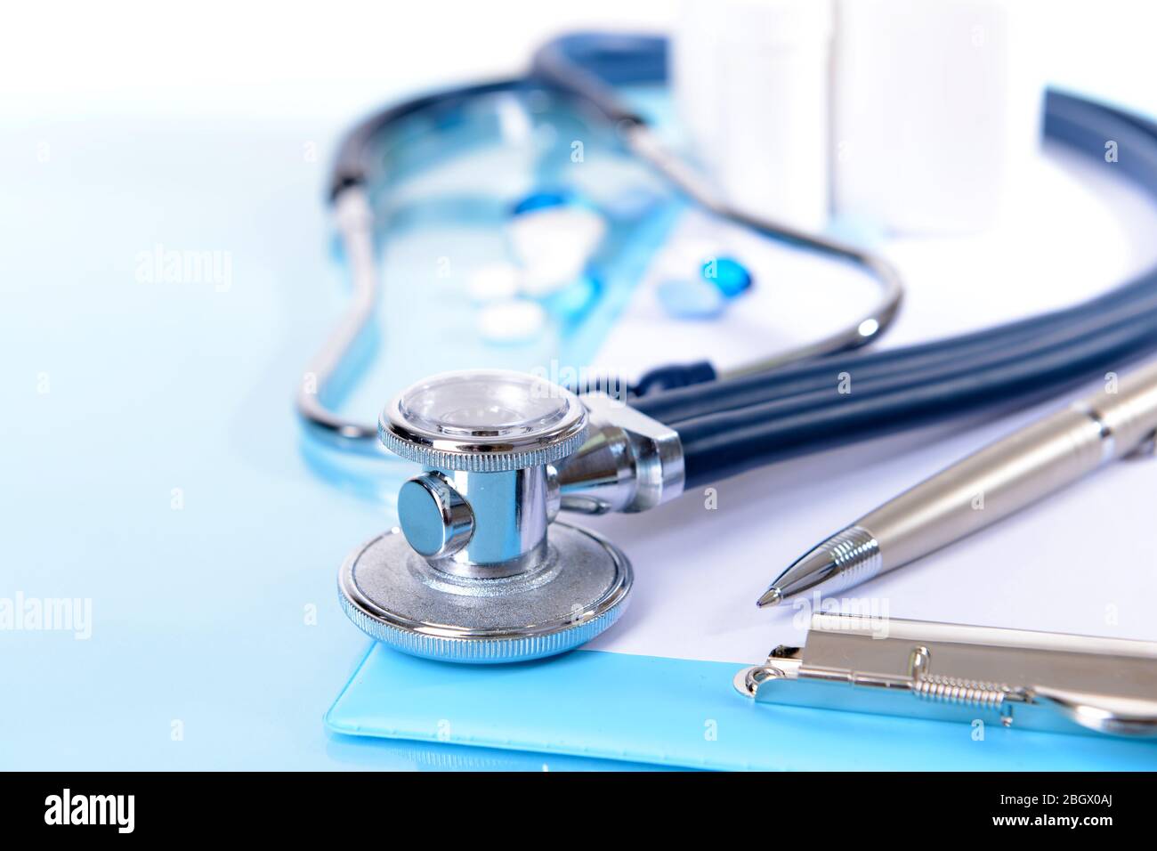 Stethoscope on light blue background Stock Photo - Alamy