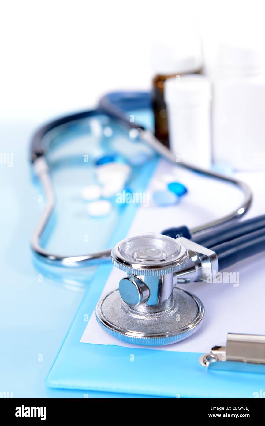 Stethoscope on light blue background Stock Photo - Alamy