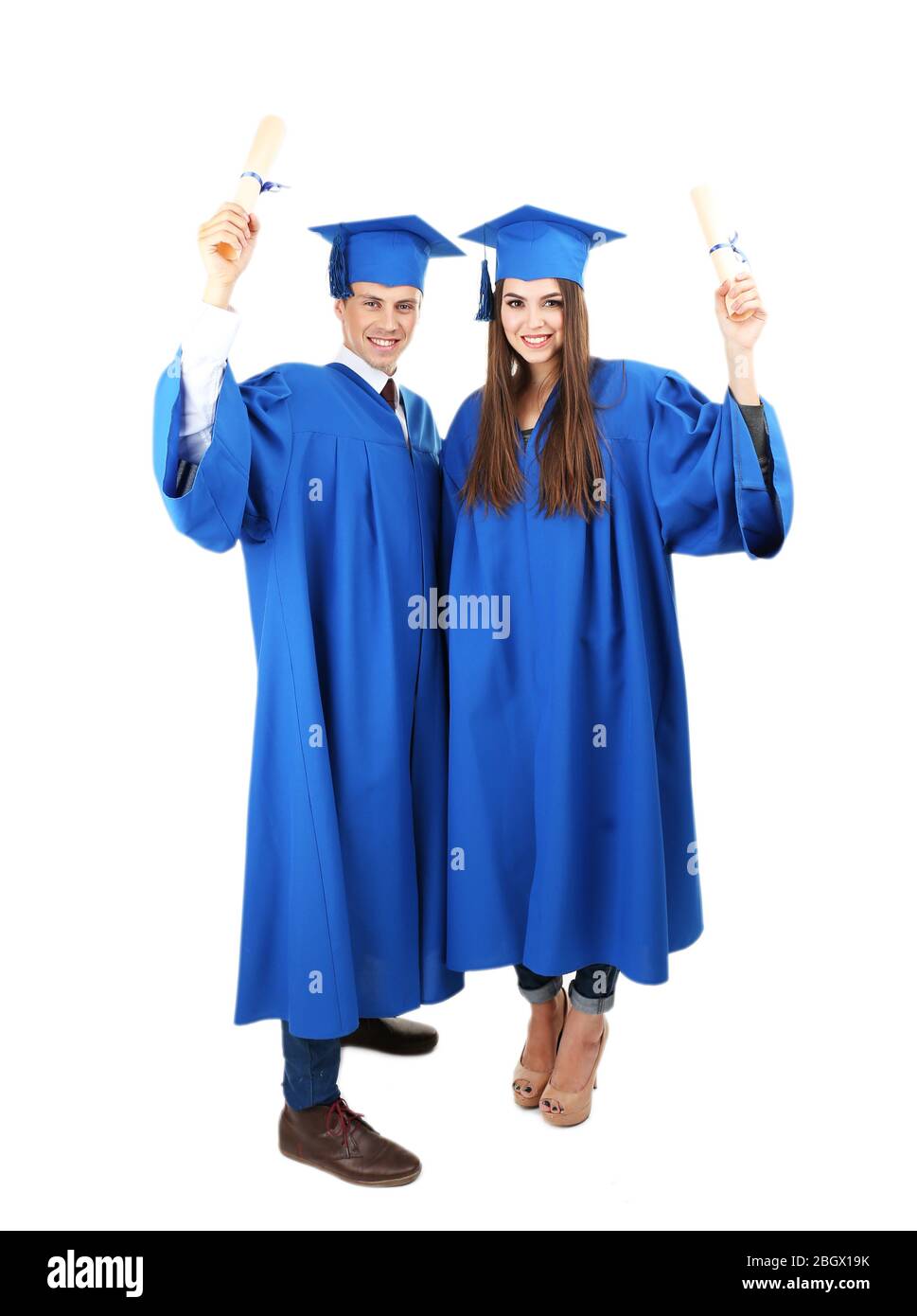 Graduate students wearing graduation hat and gown, isolated on white ...