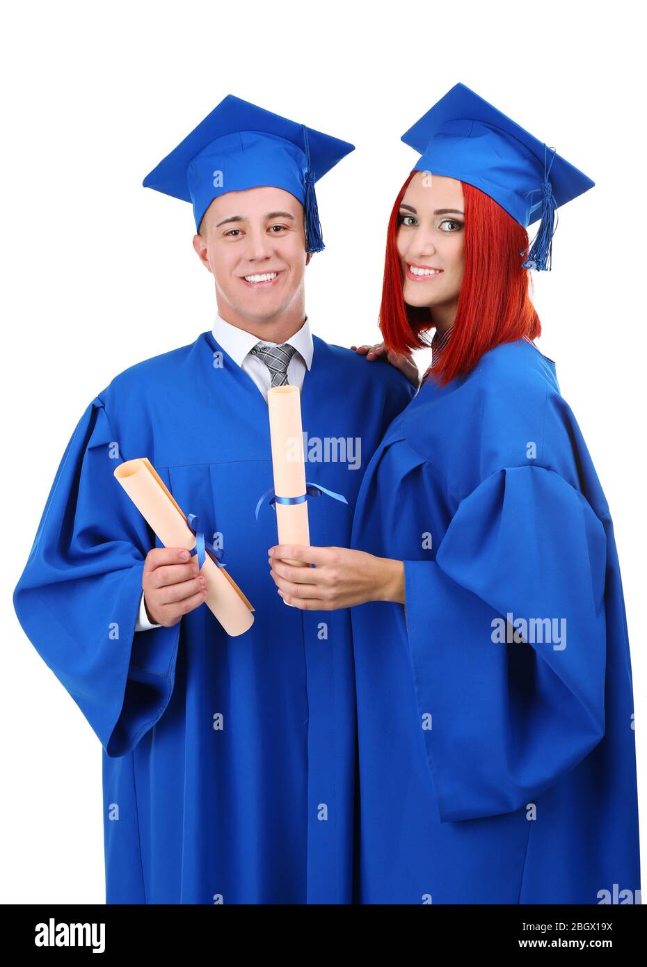 Graduate students wearing graduation hat and gown, isolated on white ...