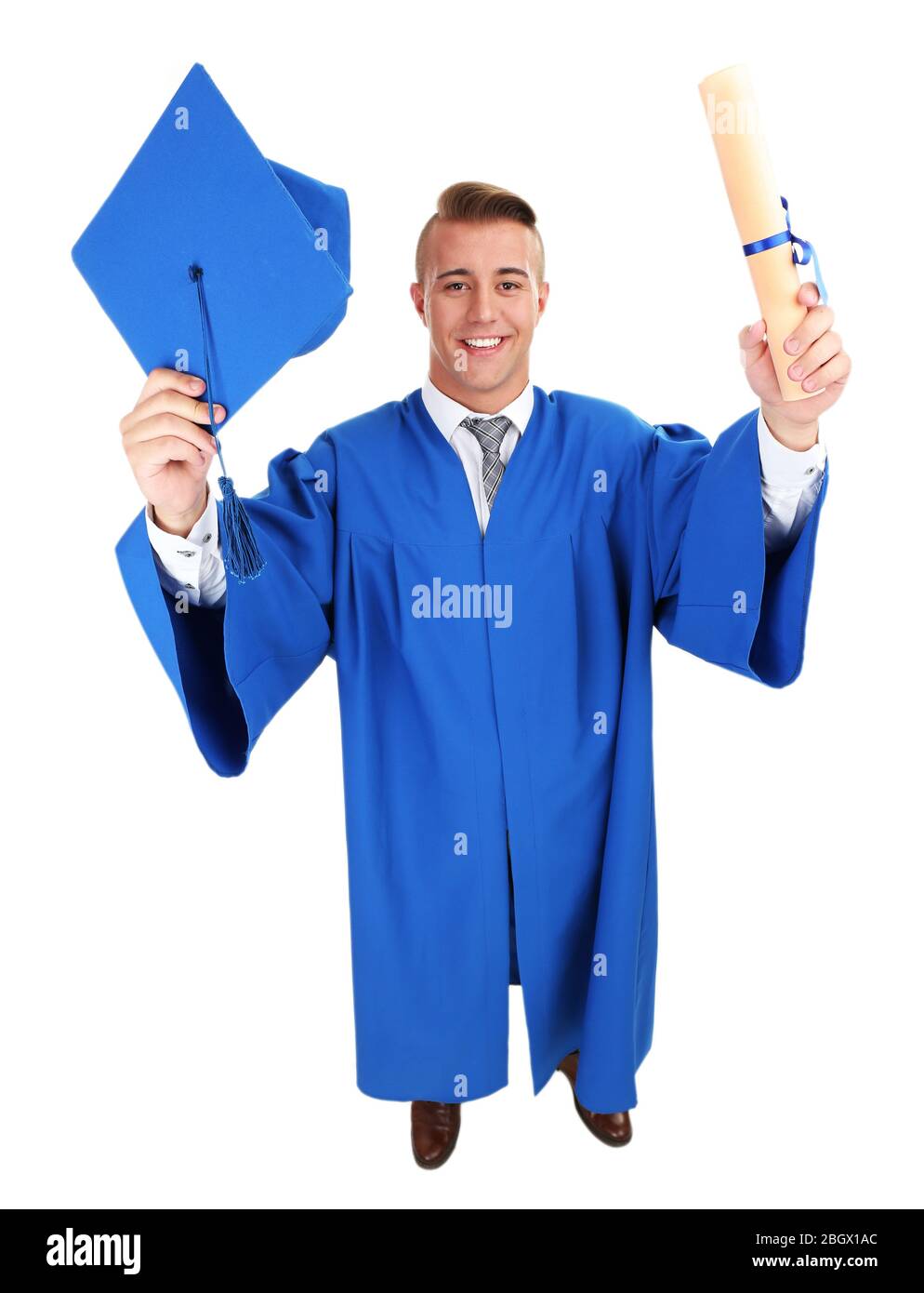 Man graduate student wearing graduation hat and gown, isolated on white ...
