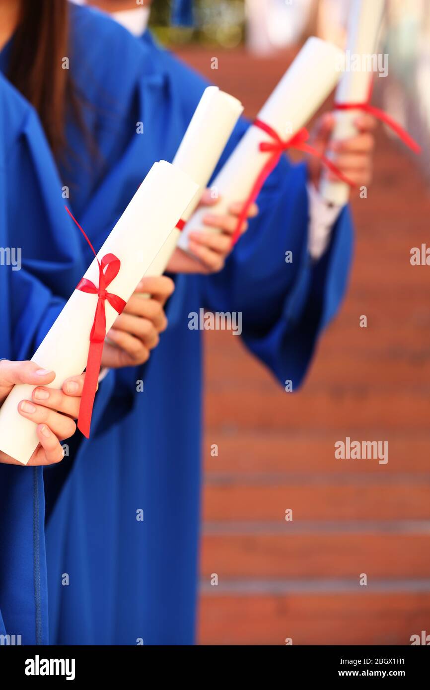 Graduate diplomas hi-res stock photography and images - Alamy