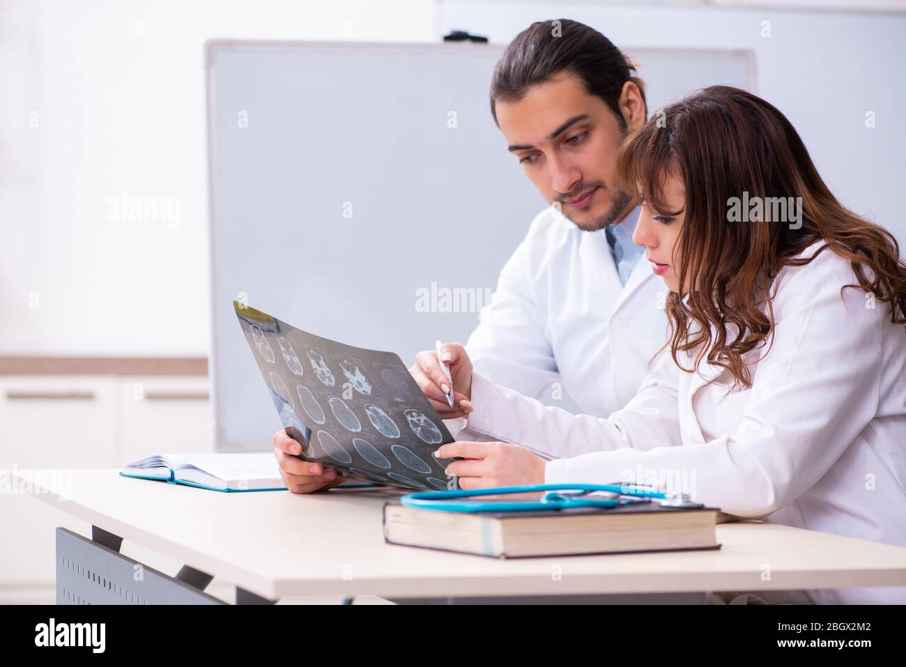 Female doctor studying ct hi-res stock photography and images - Alamy