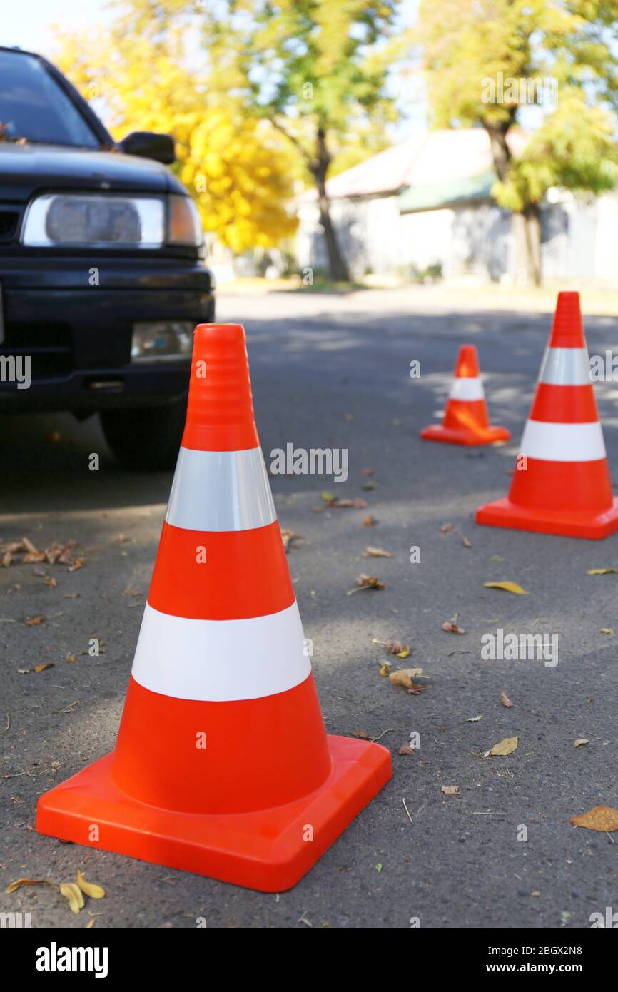 Traffic cone on road Stock Photo - Alamy