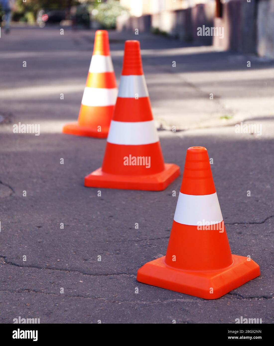 Traffic cone on road Stock Photo - Alamy