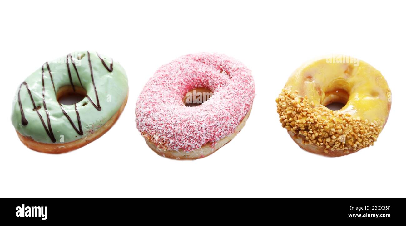 Delicious donuts with color glaze isolated on white Stock Photo - Alamy