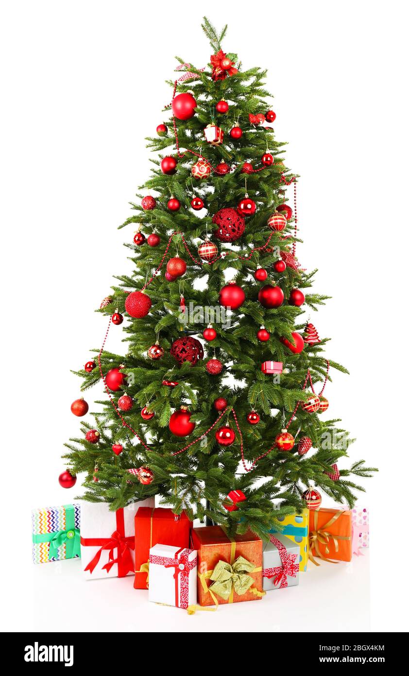 Decorated Christmas tree with gifts isolated on white Stock Photo - Alamy