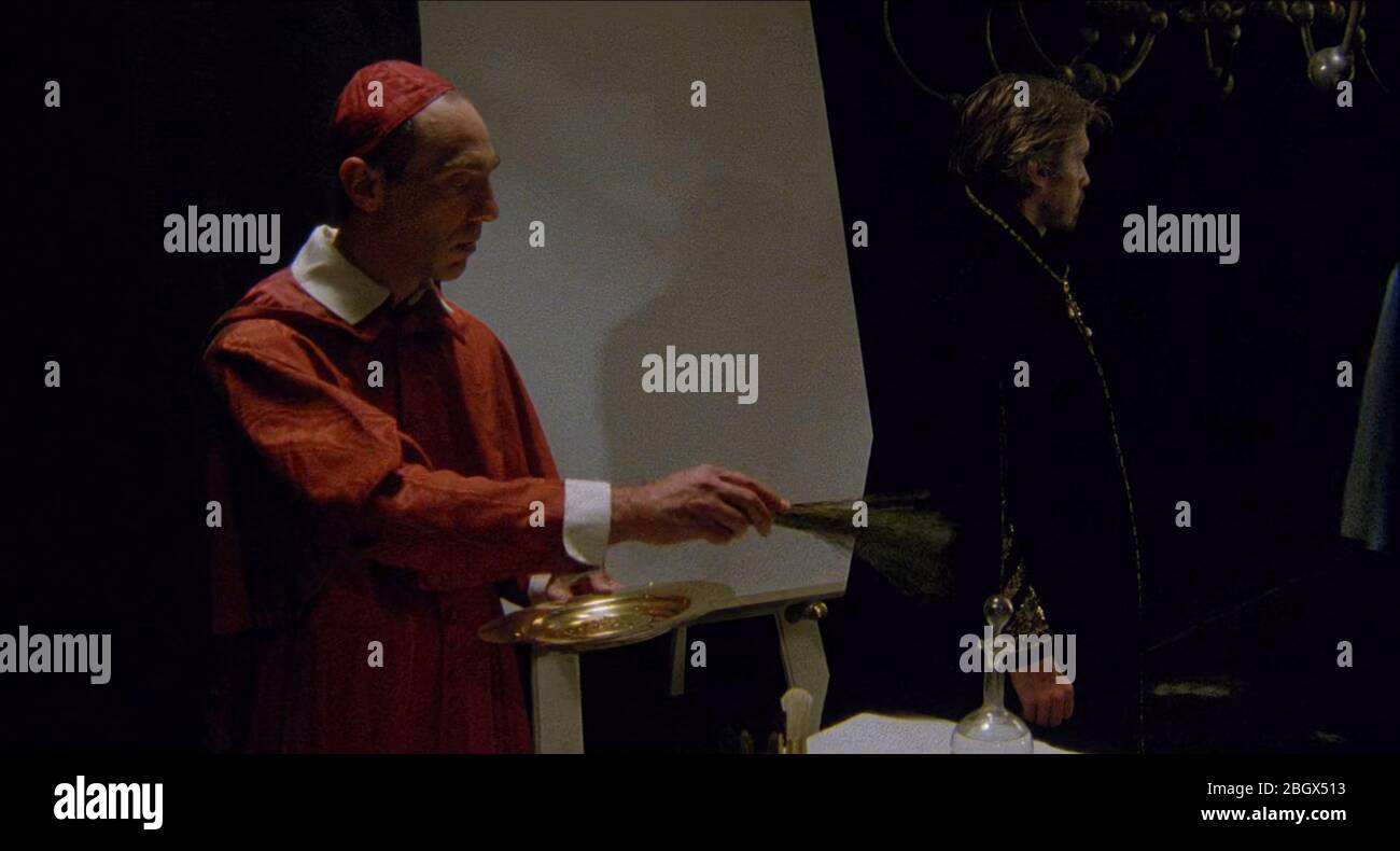 London.UK. Derek Jarman (playing a priest) and Nigel Terry as ...