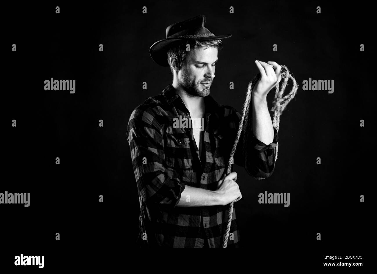 Western life. Man unshaven cowboy black background. Man wearing hat ...