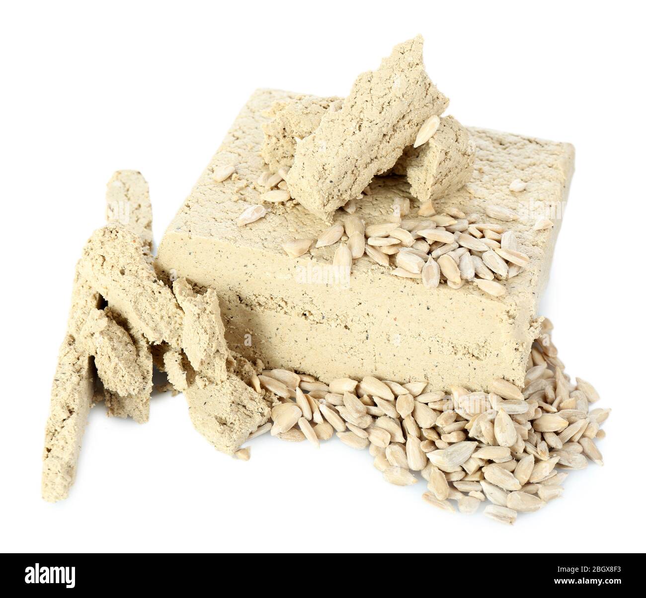 Sunflower halva isolated on white background Stock Photo - Alamy