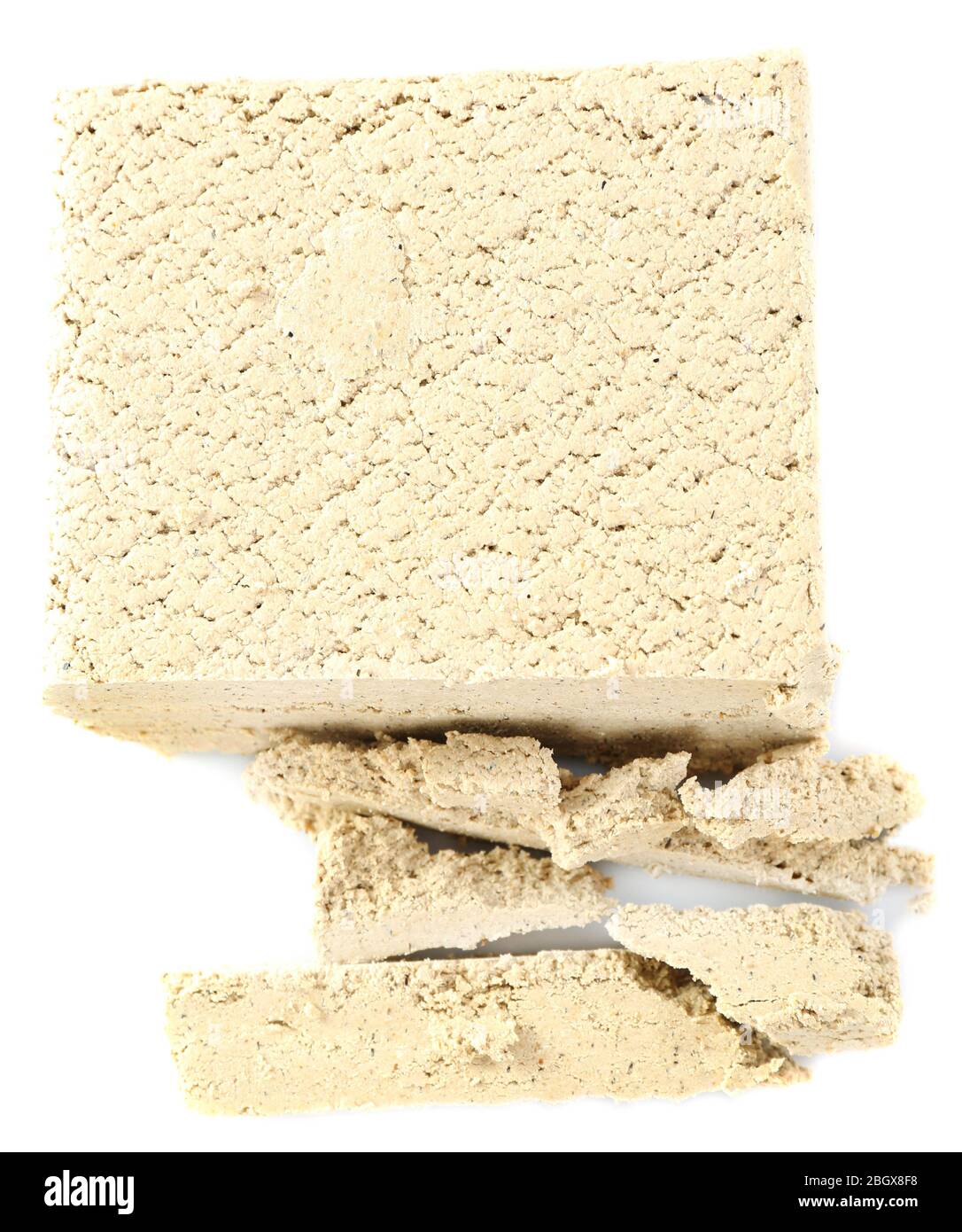 Sunflower halva isolated on white background Stock Photo - Alamy