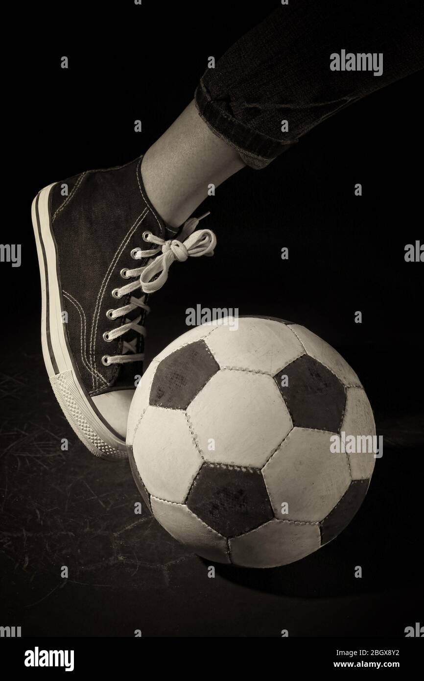 Soccer ball on black background Stock Photo - Alamy