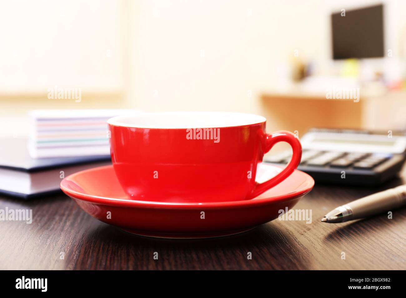 Cup of coffee in office Stock Photo - Alamy