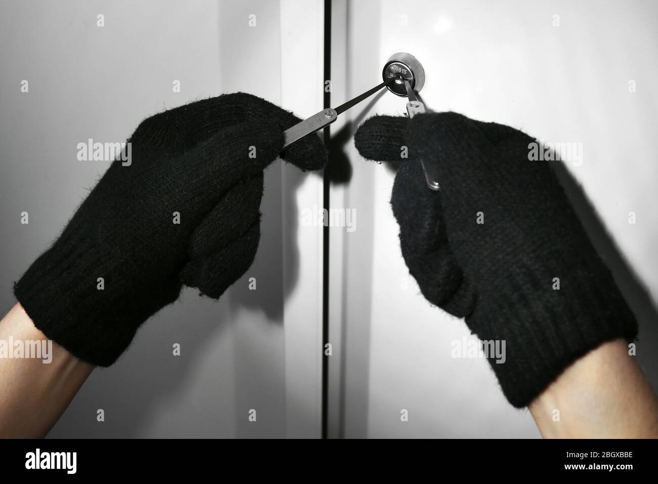 Picking a lock Stock Photo - Alamy