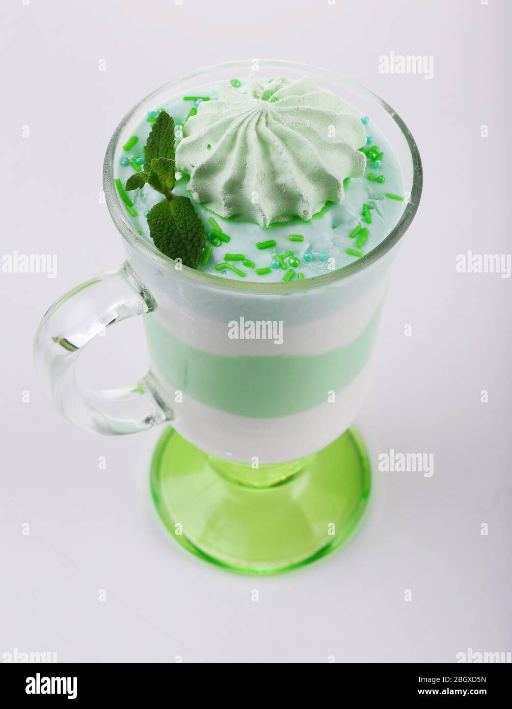 Mint milk dessert in glass isolated on white Stock Photo - Alamy