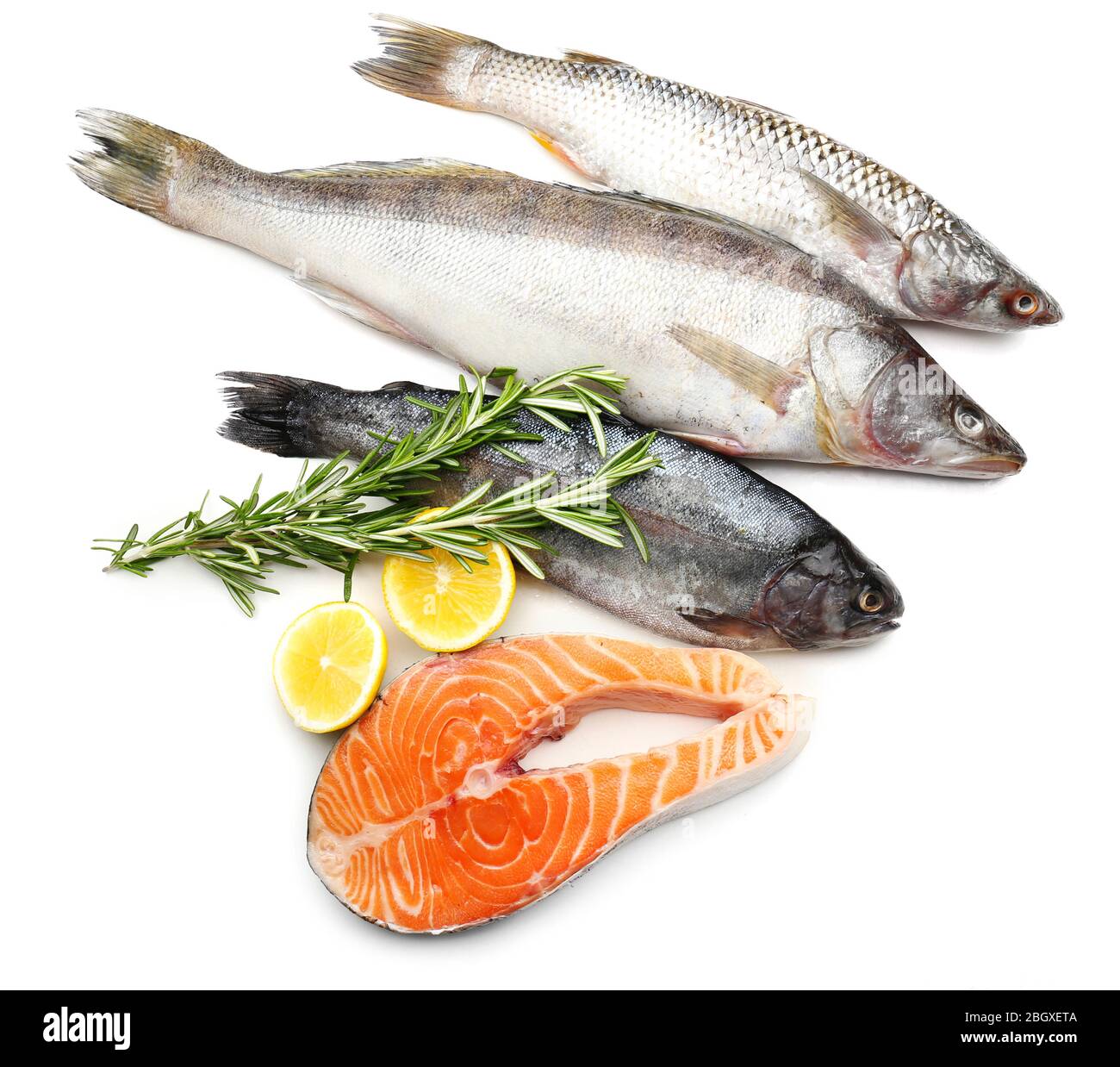 Fresh fish with lemon and rosemary isolated on white Stock Photo - Alamy