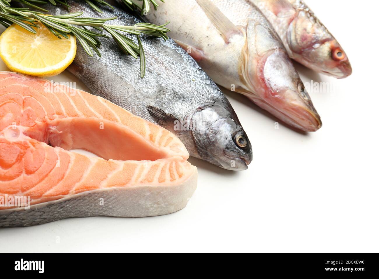 Fresh fish with lemon and rosemary, close-up Stock Photo - Alamy