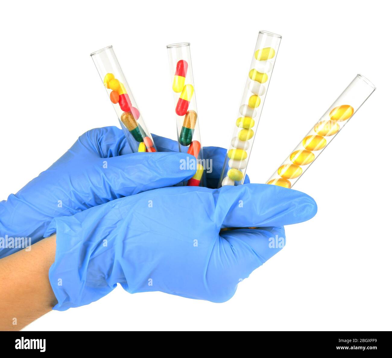 Hand holding test tubes with different color drugs, isolated on white ...
