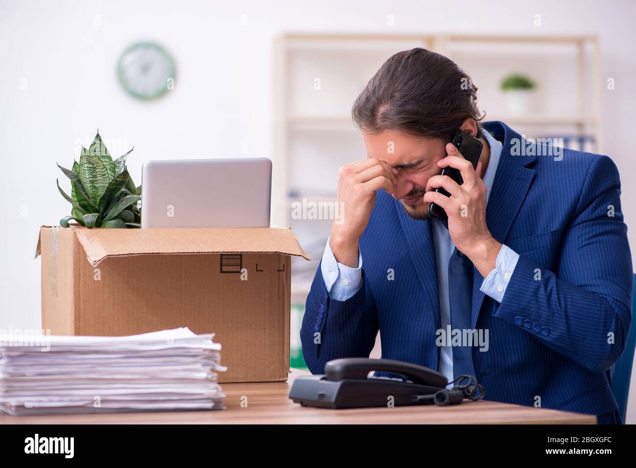 Man being fired from office hi-res stock photography and images - Alamy