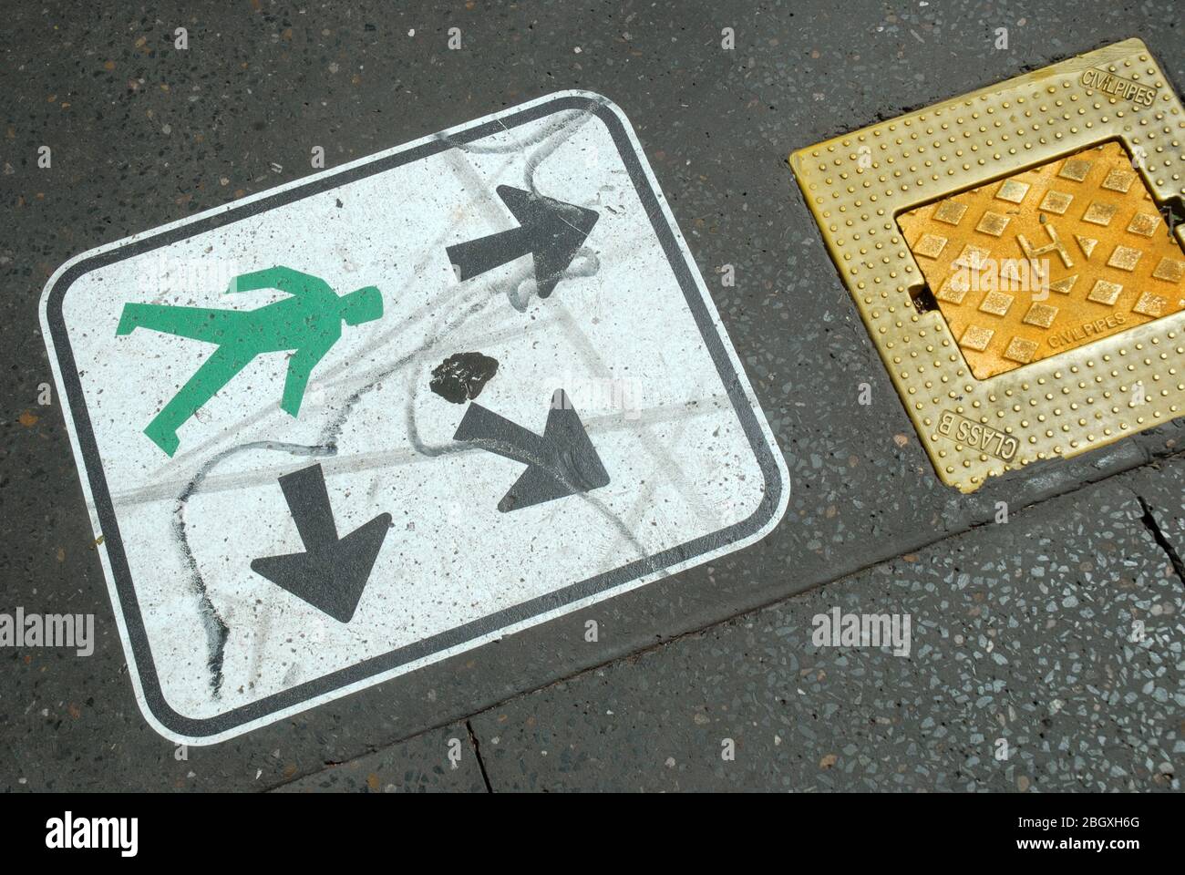 Crossing sign on pavement, Brisbane, Queensland, Australia Stock Photo ...