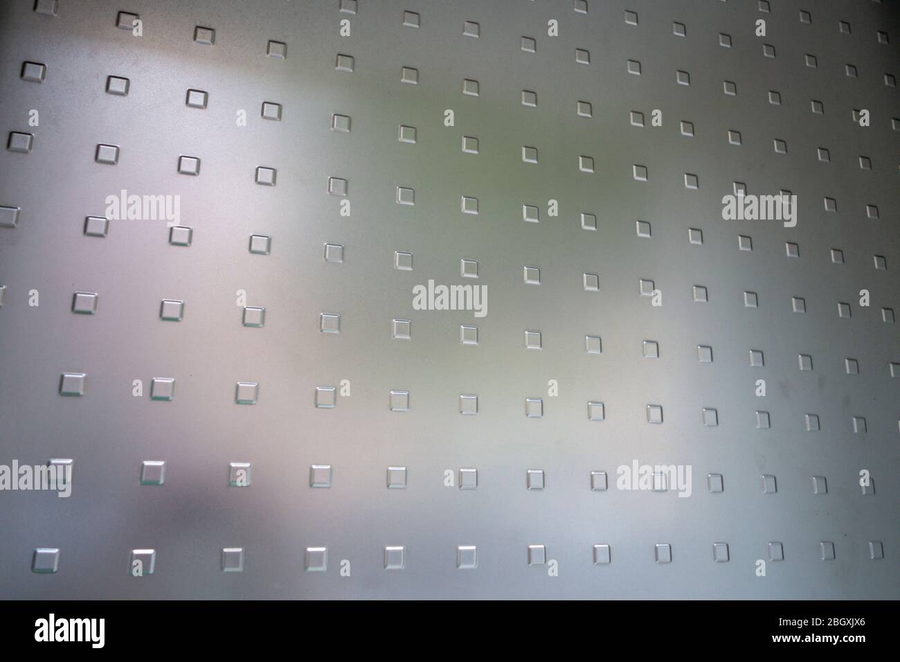 Stainless steel plate surface with embossed square pattern Stock Photo ...