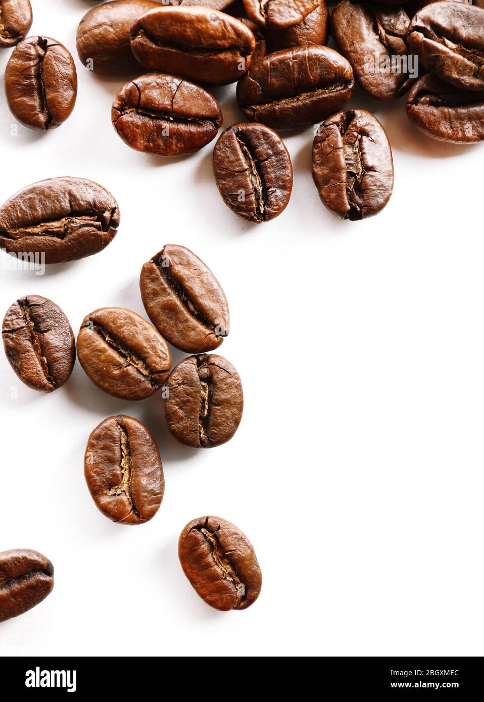 Coffee beans, isolated on white Stock Photo - Alamy