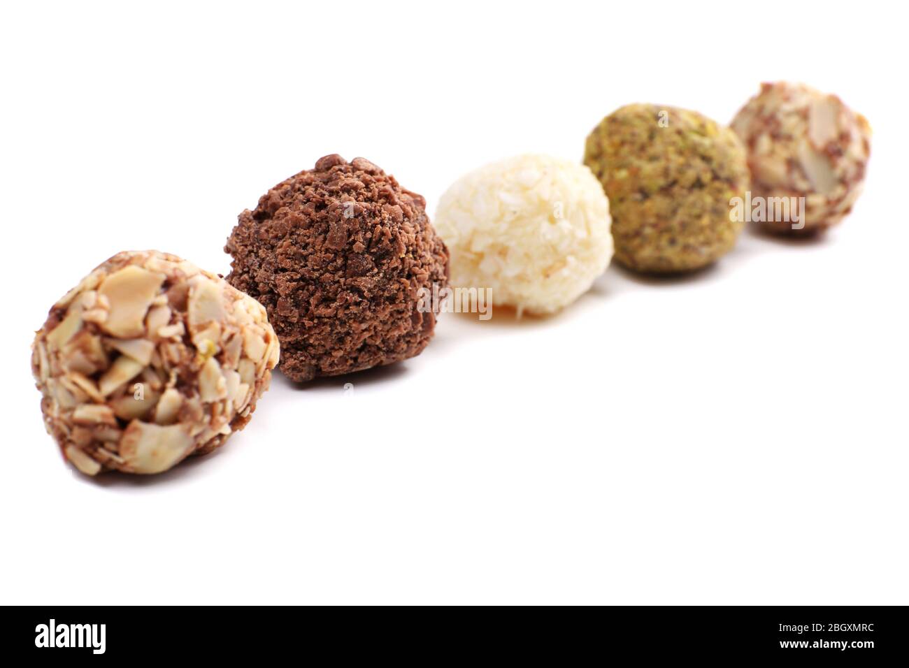 Delicious chocolate candy isolated on white Stock Photo - Alamy