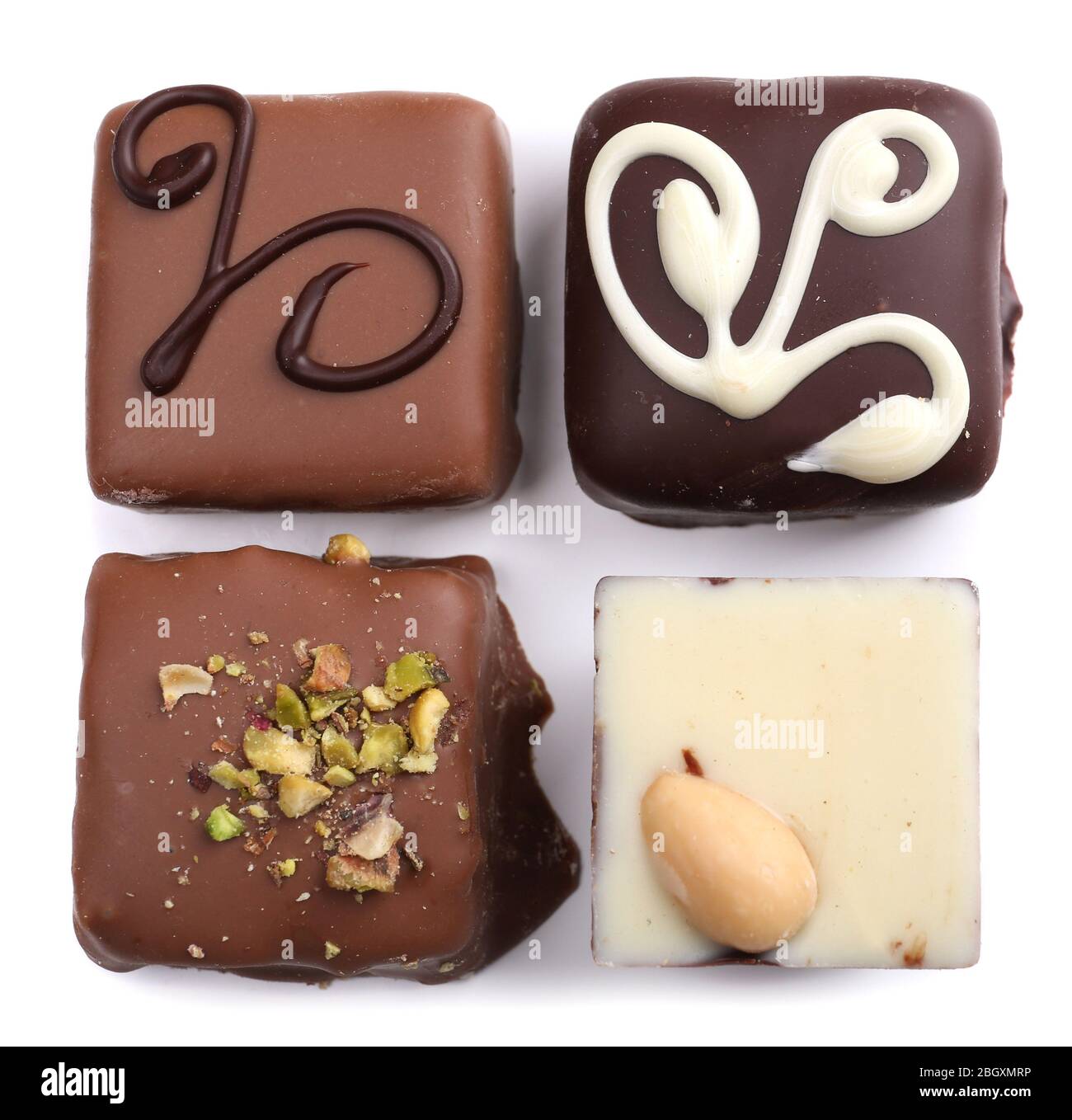 Delicious chocolate candy isolated on white Stock Photo - Alamy