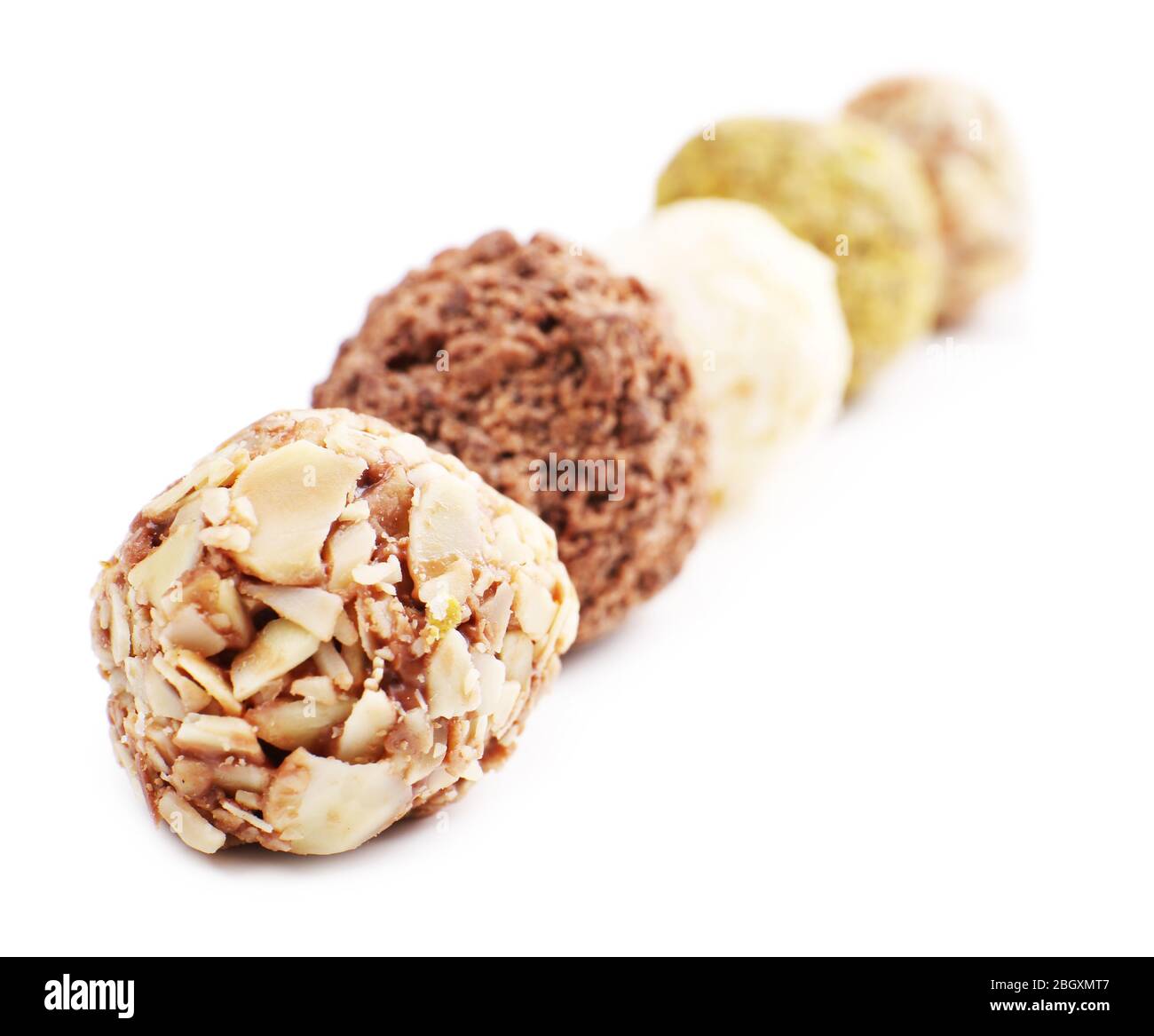 Delicious chocolate candy isolated on white Stock Photo - Alamy
