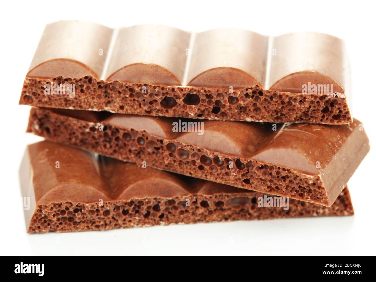 Tasty porous chocolate, isolated on white Stock Photo - Alamy