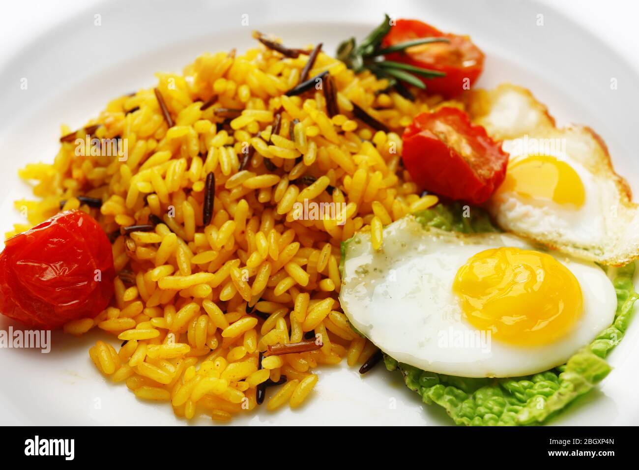 Tasty rice served on table, close-up Stock Photo - Alamy