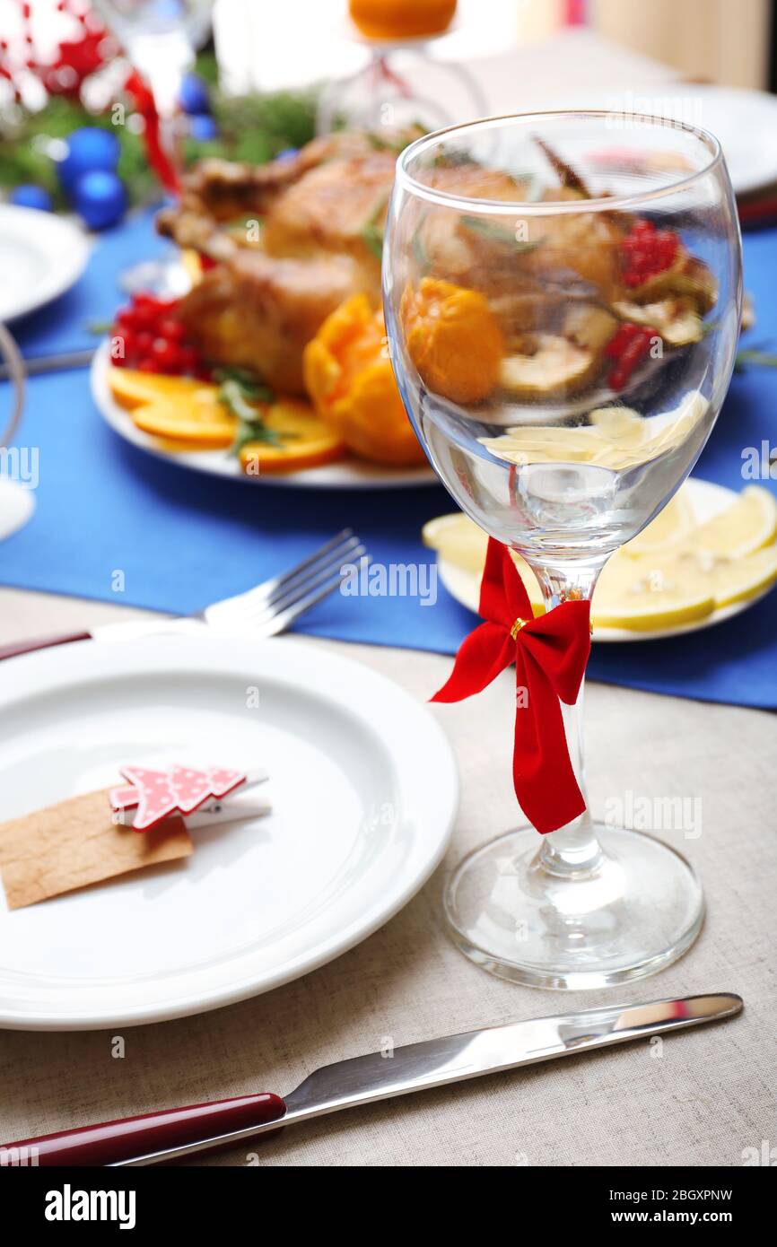 Baked chicken for festive dinner. Christmas table setting Stock Photo ...