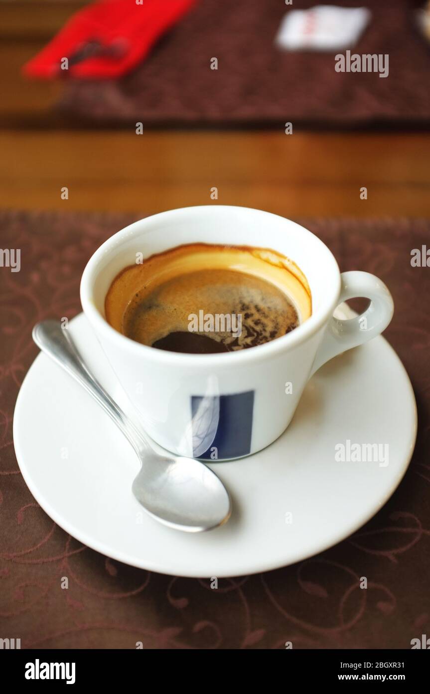 Cup of tasty coffee in cafe Stock Photo - Alamy