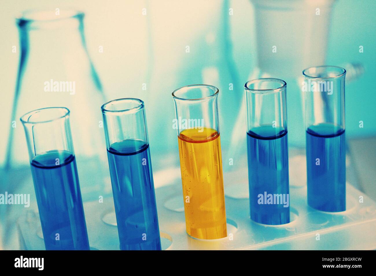 Test-tubes filled with color fluid close-up Stock Photo - Alamy