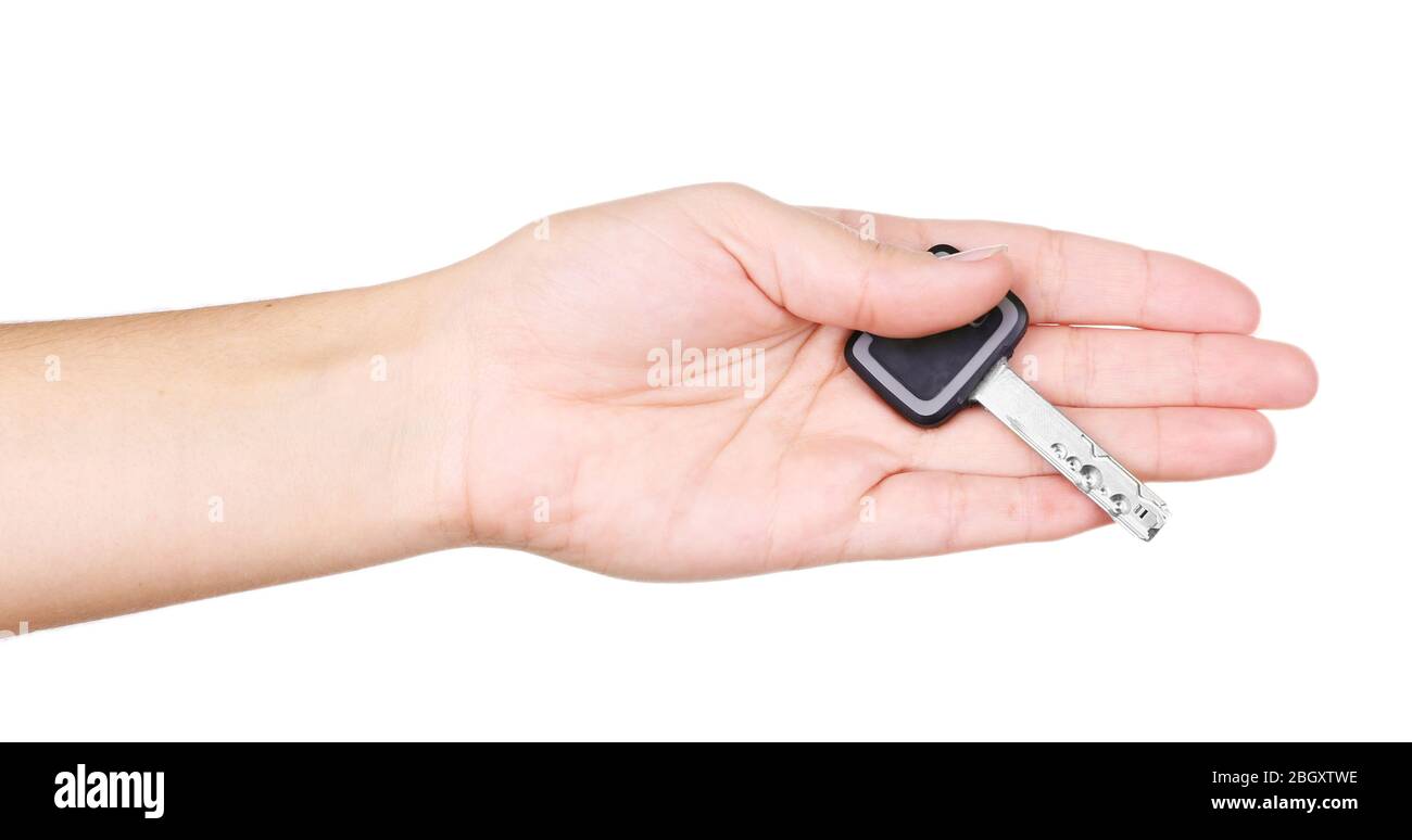 Key in hand isolated on white Stock Photo - Alamy