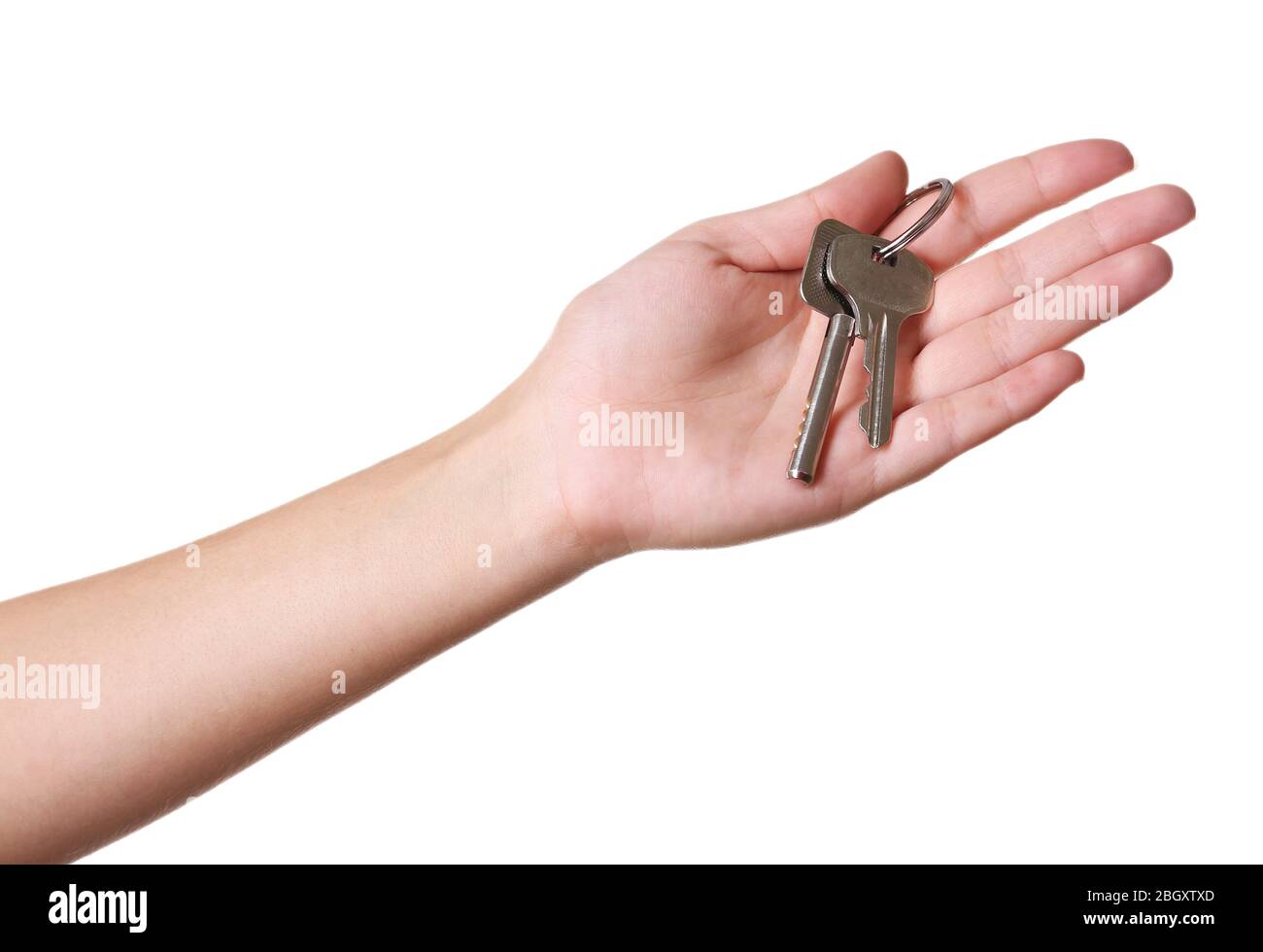 Keys in hand isolated on white Stock Photo - Alamy