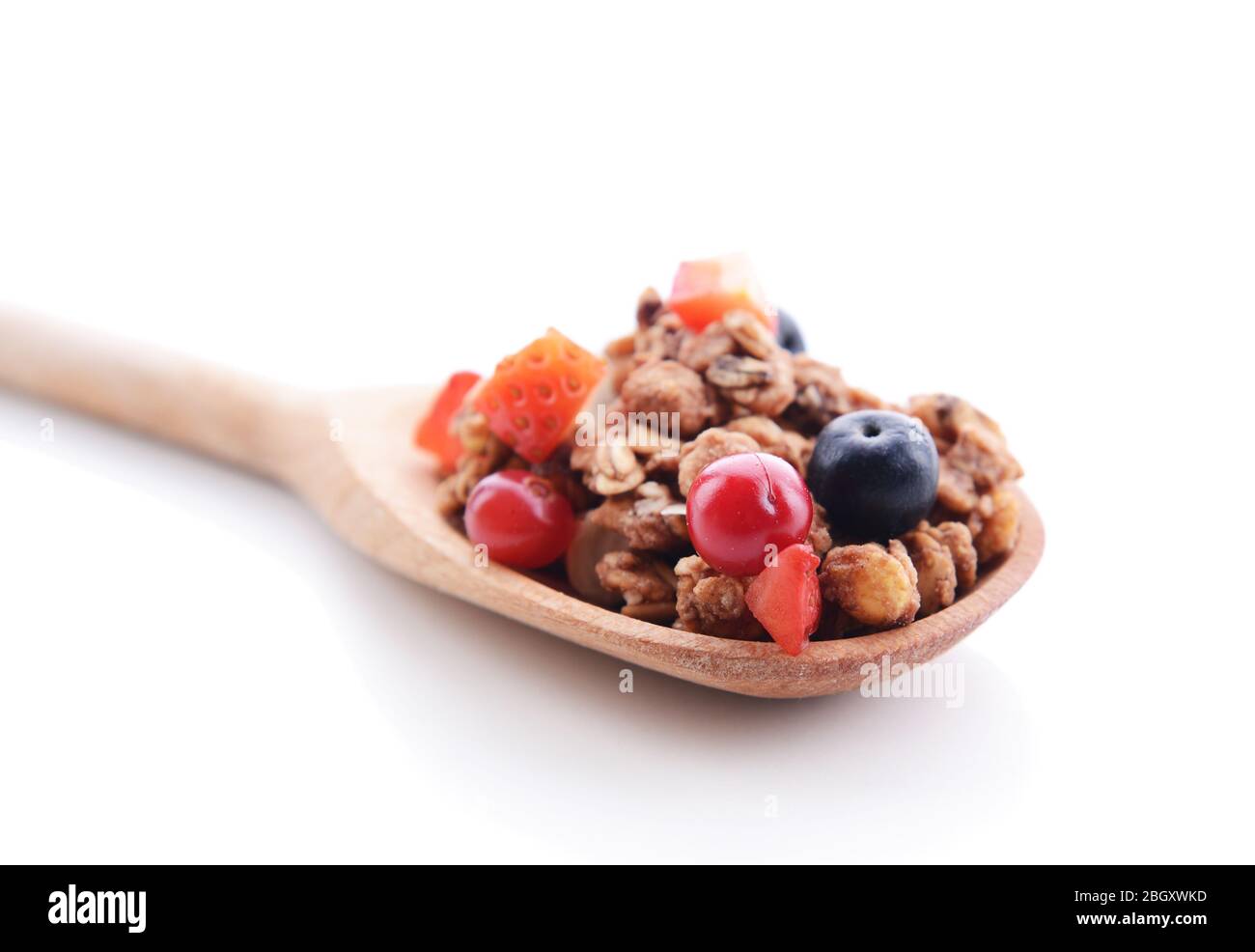 Granola in spoon on Cut Out Stock Images & Pictures - Alamy
